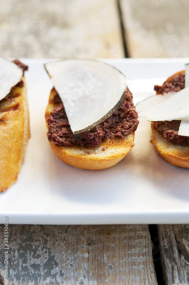 Radish Canapes with Black-Olive Tapenade Stock Photo | Adobe Stock