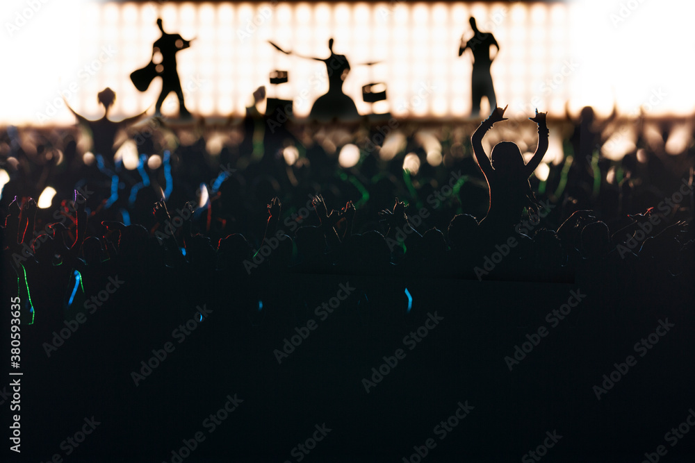 Rock band playing, audience clapping their hands Stock Photo | Adobe Stock