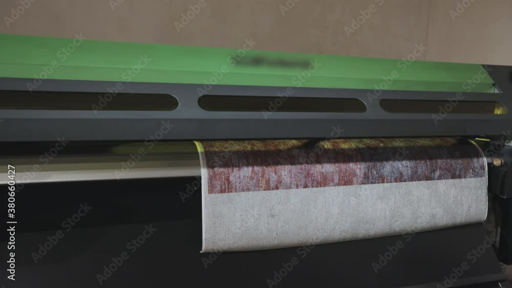 Modern wallpaper factory. Industrial printer making new wallpaper ...