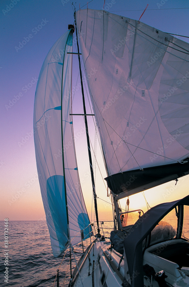 sailboat rigged with spinnaker and main sail sailing Stock Photo ...