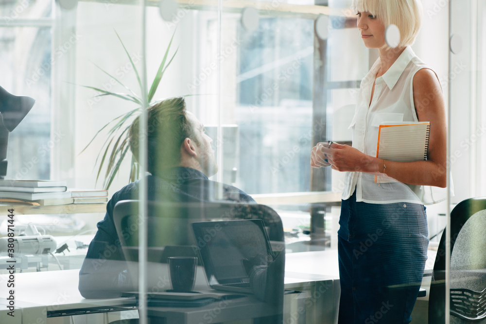 Business meeting at work at trendy startup company discussing planning ...