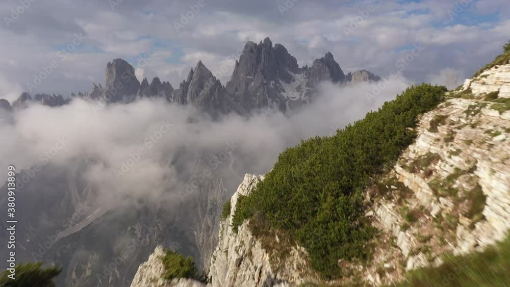 Drone flight along steep hiking trail reveals spectacular jagged ...