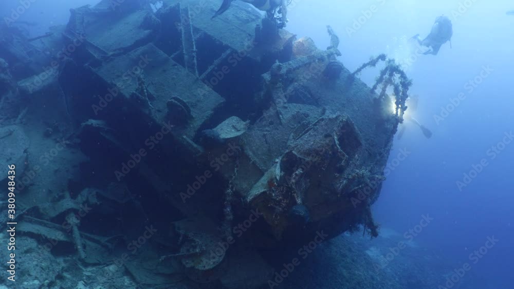 scuba divers exploring shipwreck scenery underwater ship wreck deep ...