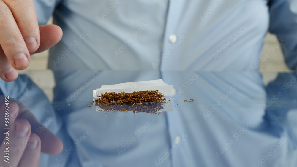 Handmade Cigarette Using Cigarette Paper, Filter, and Tobacco Stock ...