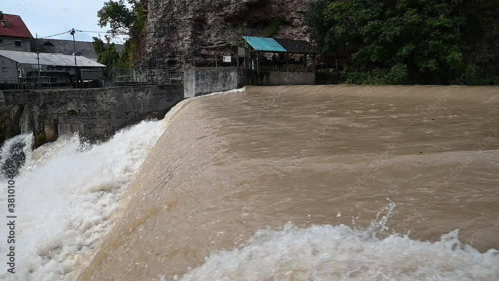 Close up view raging river after autumn rainfall. Dangerous river ...