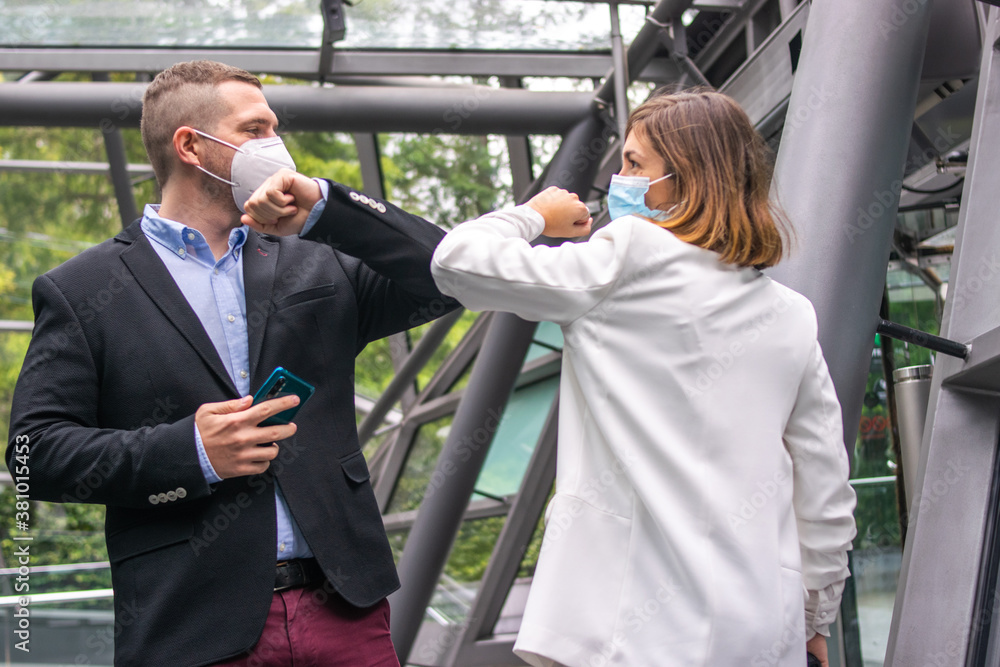 Photo of two young and attractive work colleagues. Wearing smart casual ...