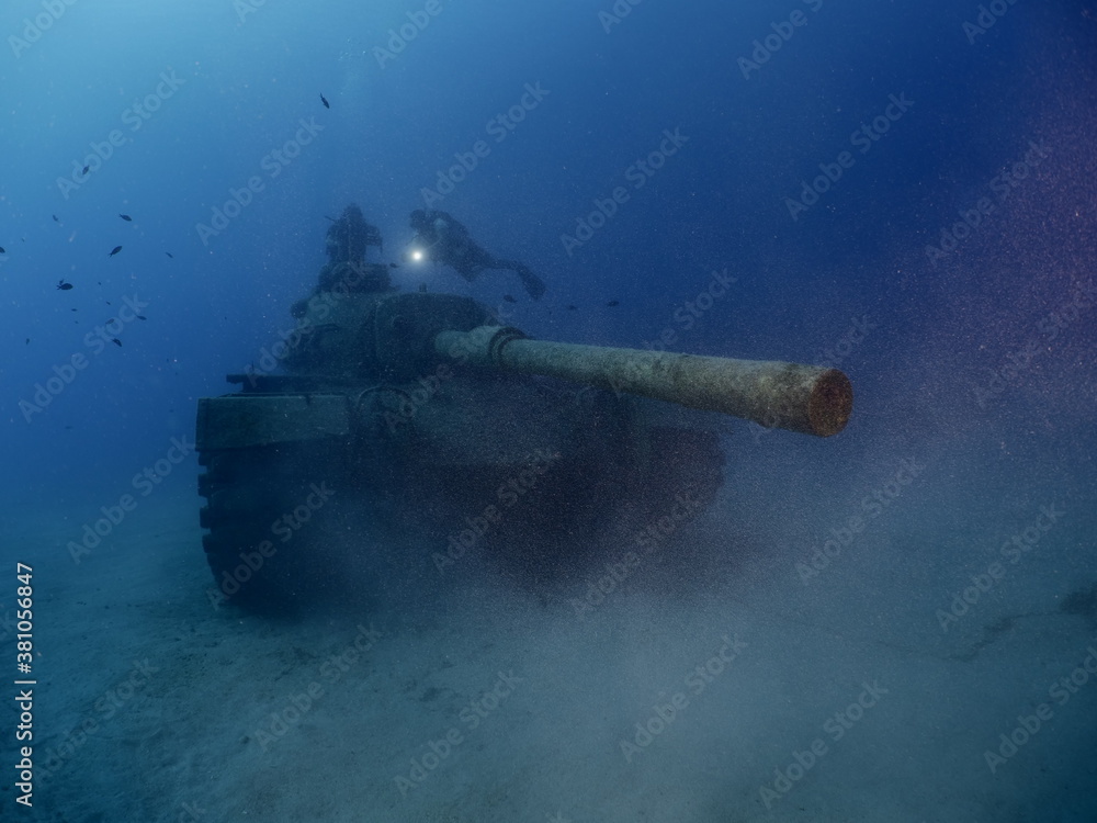 scuba diver exploring tank wreck underwater wreck dive blue water kas ...