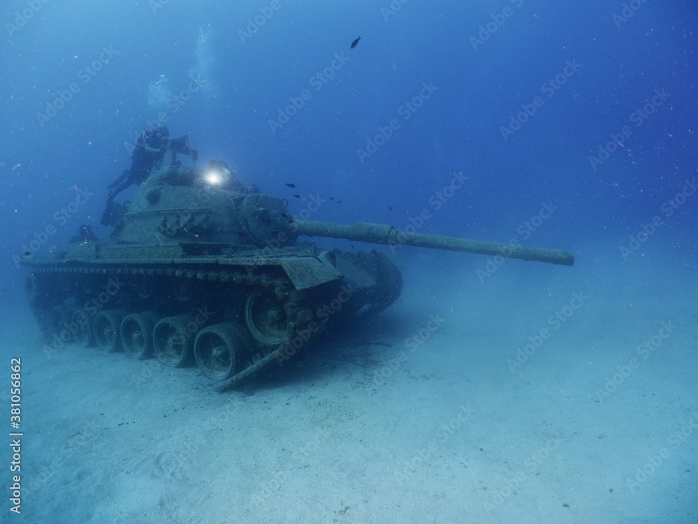 scuba diver exploring tank wreck underwater wreck dive blue water kas ...