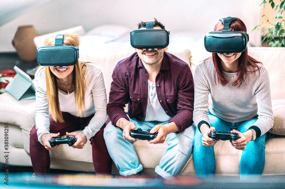 Millennial friends playing with vr glasses at home - Virtual reality ...