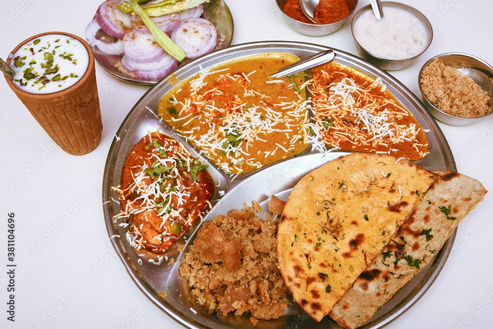 Top view of traditional Rajasthani thali Jaipur, India. Missi and jowar ...