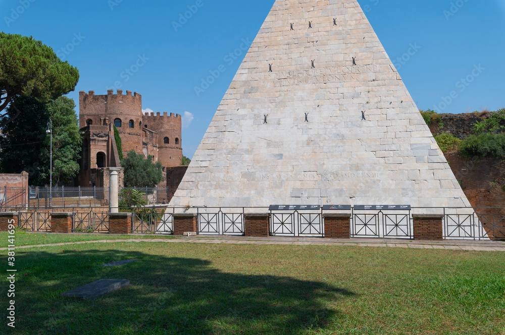 The Piramide Cestia or Pyramid of Cestius seen from the park of the non ...