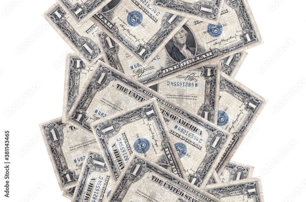 1 US dollar bills flying down isolated on white. Many banknotes falling ...
