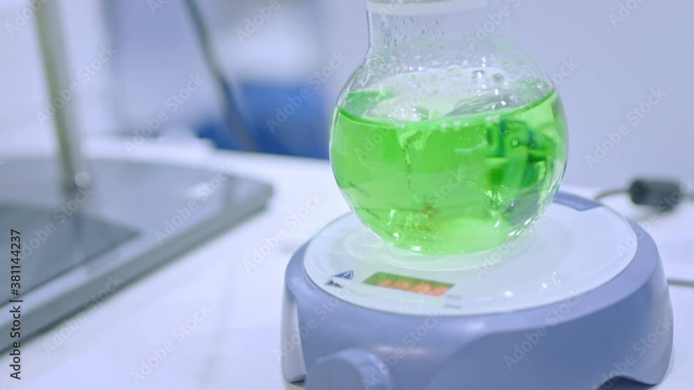 magnetic mixer stirrer with fast moving stir bar for mixing liquid at ...