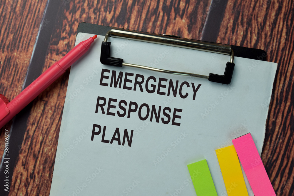 Emergency Response Plan write on a paperwork isolated on office desk ...