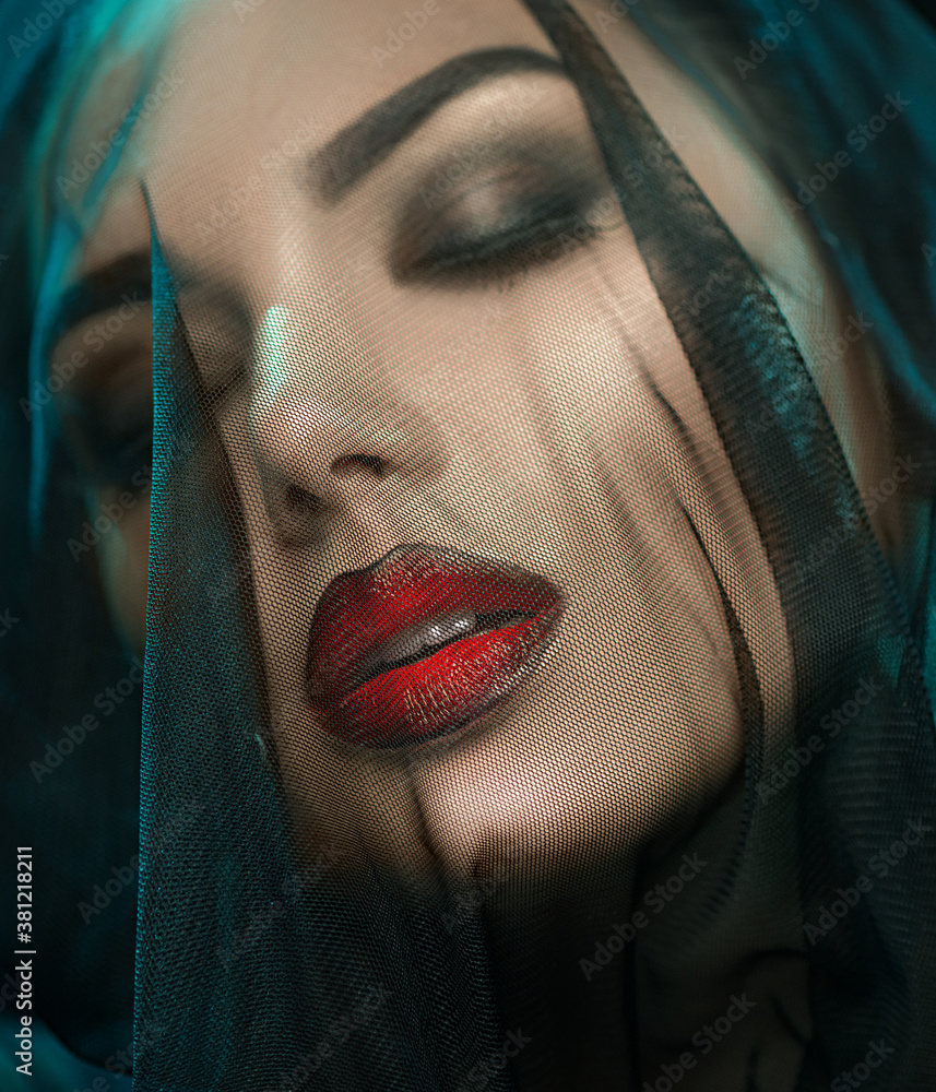 Vampire Halloween Woman portrait with black veil on a face. Beauty Sexy ...