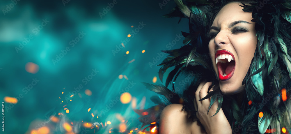 Vampire Woman with red bloody lips close-up. Vampire girl with fangs ...