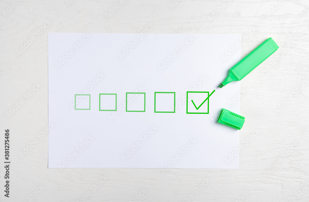 Green marker with checkbox in checklist. Stock Photo | Adobe Stock