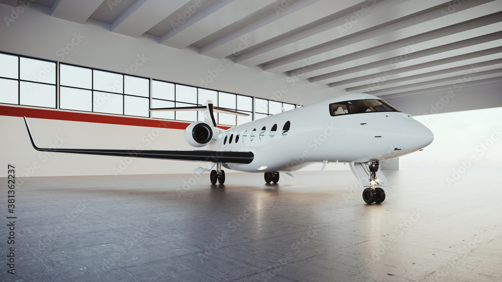 Luxury white private business jet with black wings parked in a spacious ...