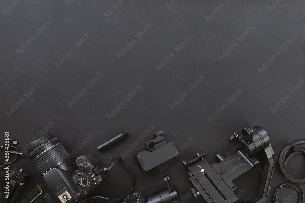 top view of work space photographer with digital camera and accessory ...