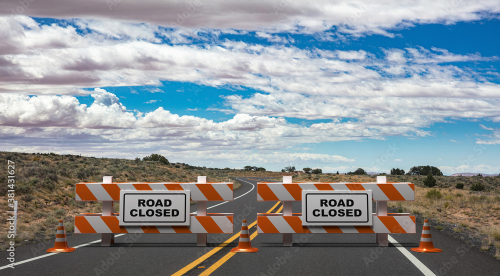 Closed road sign, street barriers and traffic cones on empty highway ...