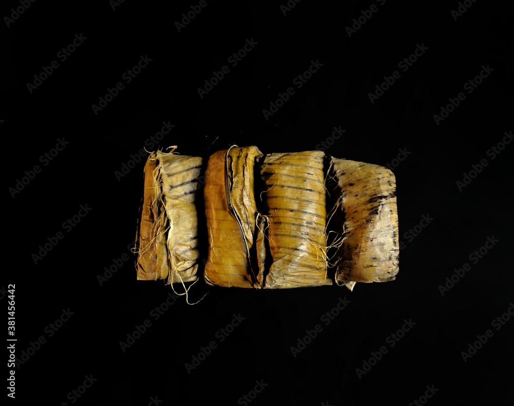 Chipilin tamales on black background. typical food of Guatemala Stock ...