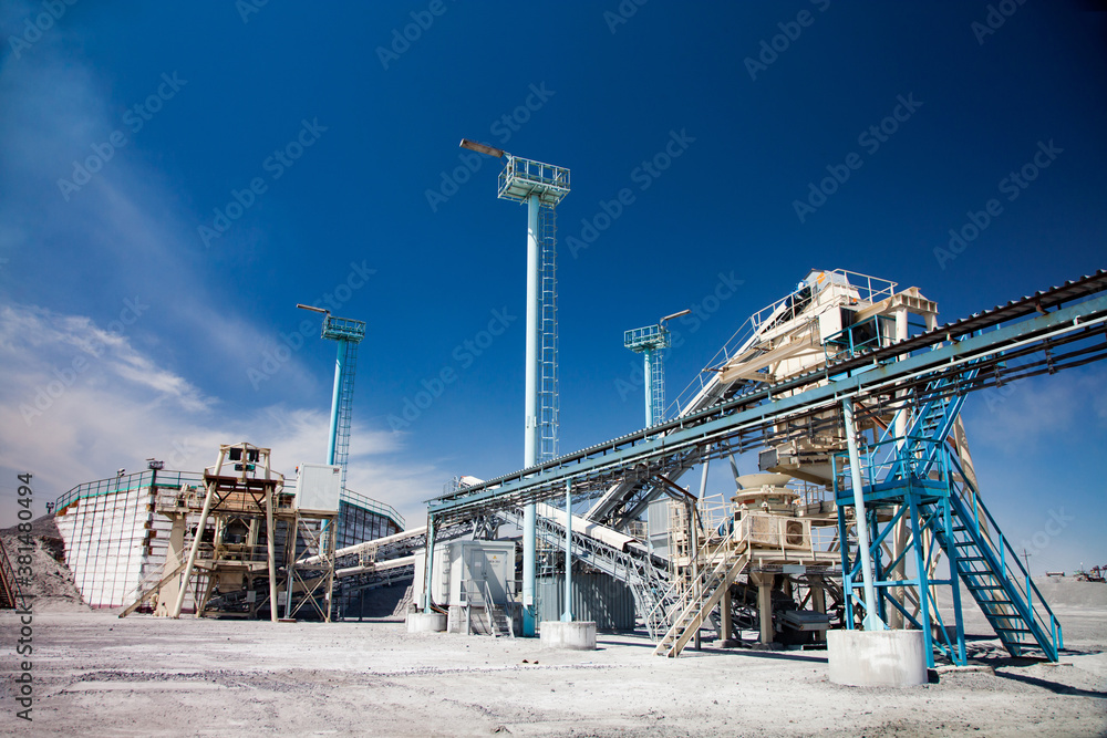 Gold processing and refining. Modern slag processing machine. Blue sky ...