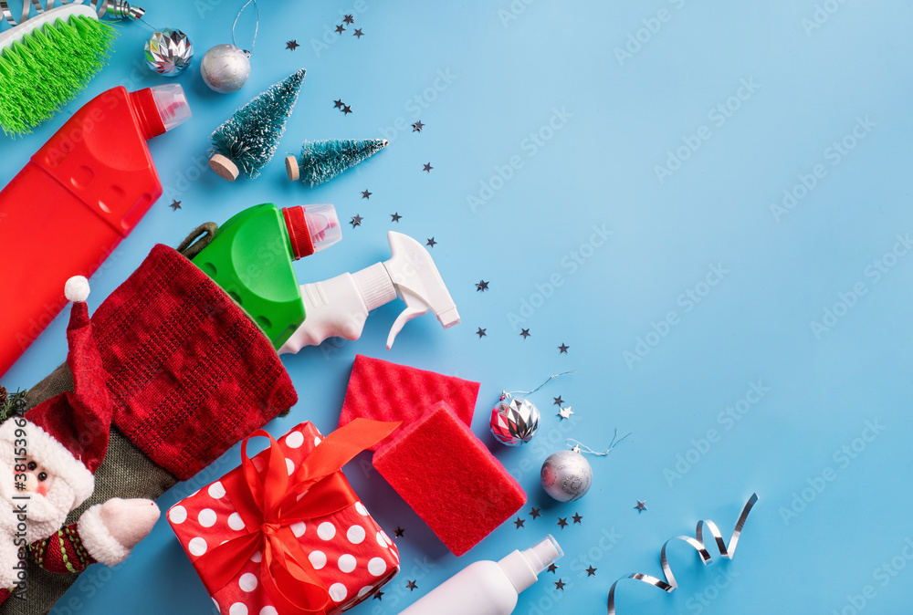 cleaning tools and materials in christmas stocking top view flat lay ...