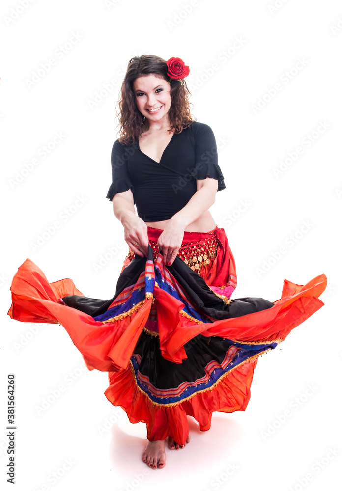 Beautiful young female flamenco dancer in traditional vivid Spanish ...