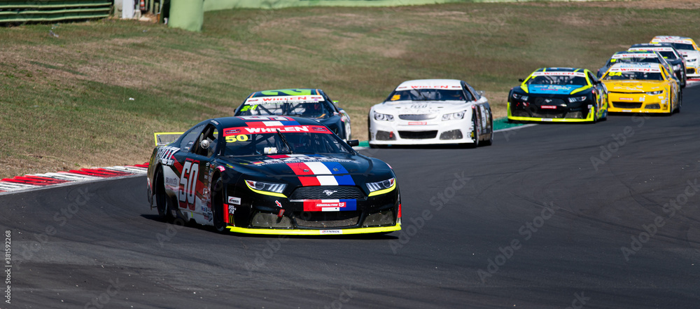Euro Nascar racing Ford Mustang car in action at turn during race Stock ...