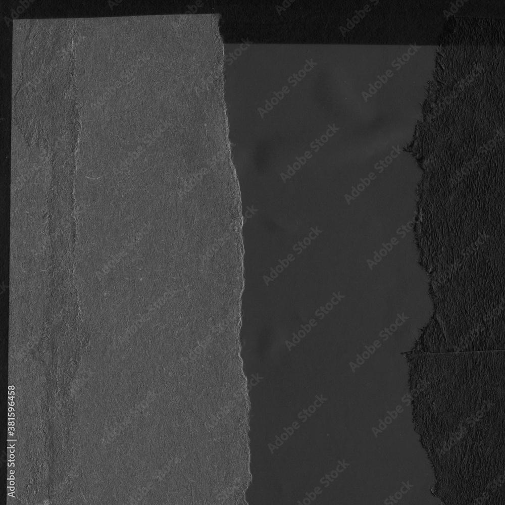 Black torn paper collage close-up. Texture made from various paper and ...