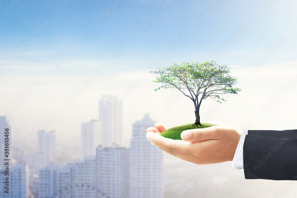 Corporate social responsibility (CSR) concept: Businessman hands ...