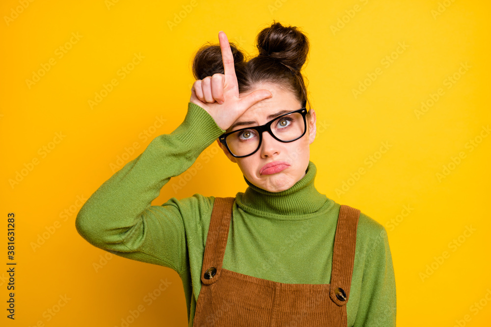 Photo of youngster student lady two buns bad mood grimacing show loser ...