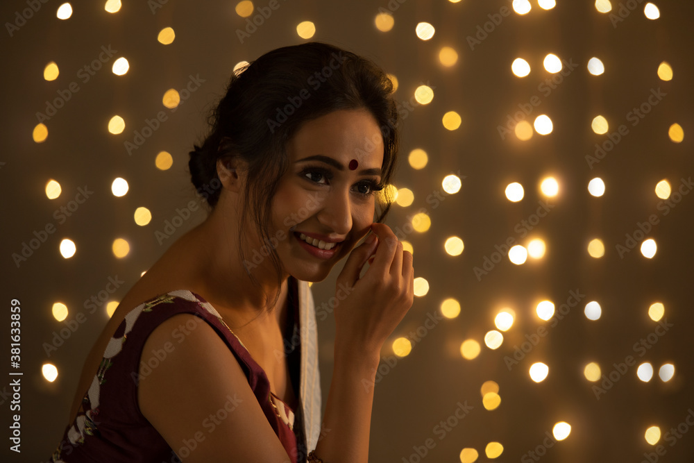 Woman in saree, smiling Stock Photo | Adobe Stock