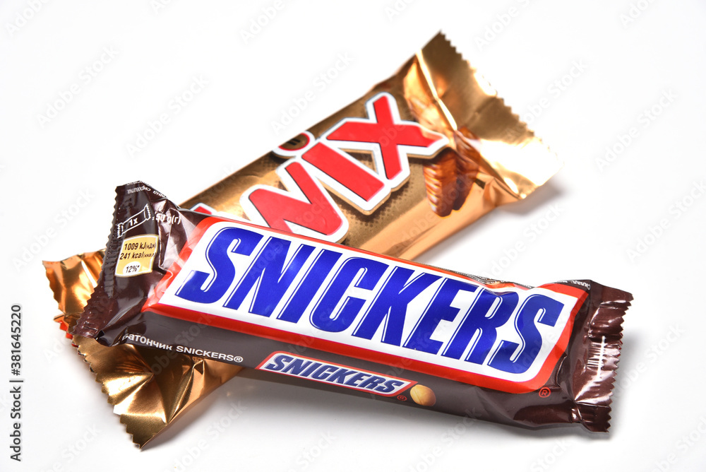 Snickers and twix chocolate bars stack on white background Stock Photo ...