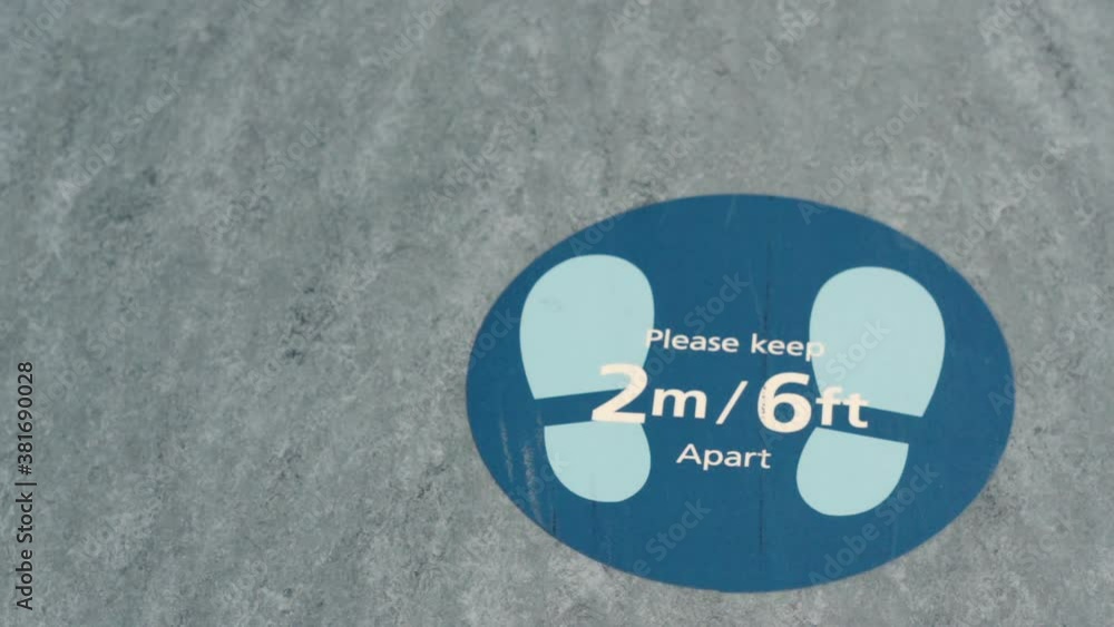 Covid19 physical distancing floor marker Stock Video | Adobe Stock