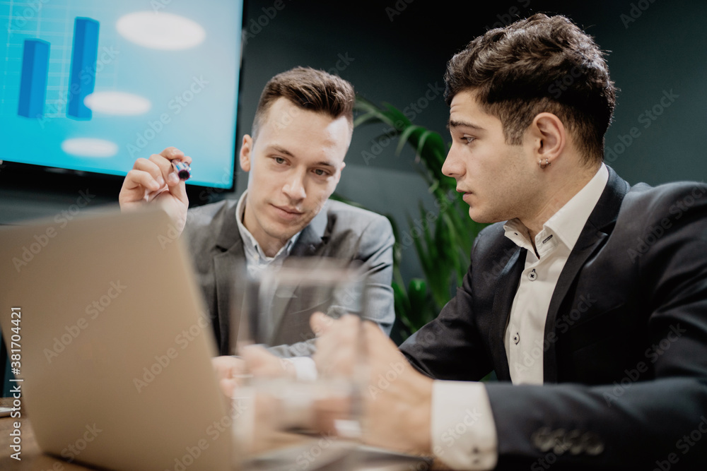 They look at the chart and tell each other about their ideas in their ...