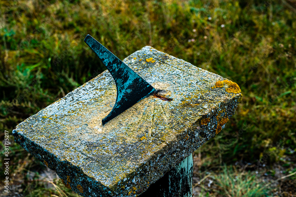 Ancient sun dial for telling the time using the sun. Made from stone ...