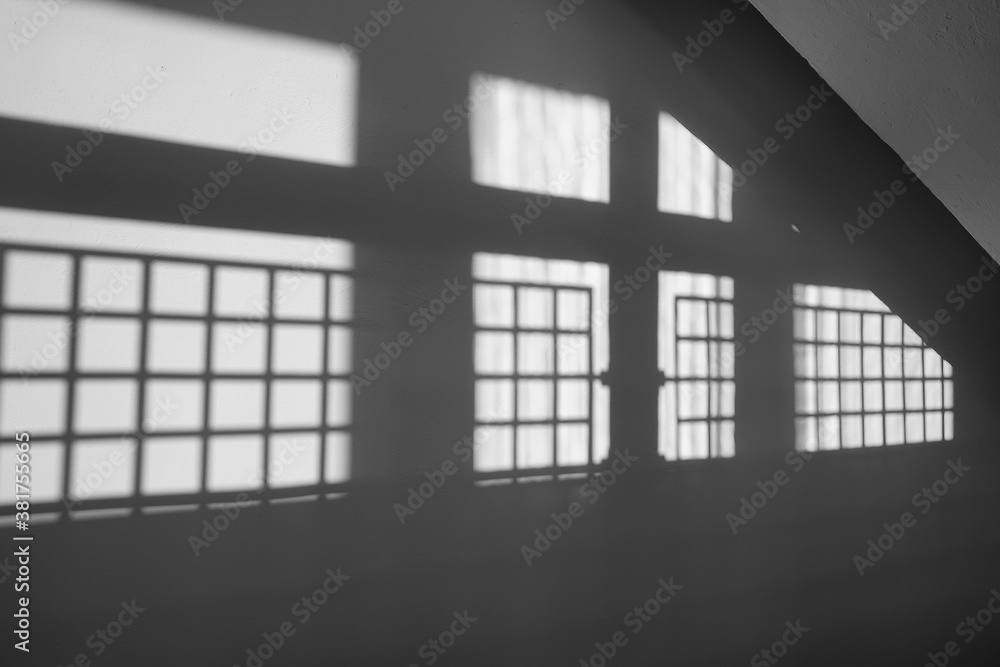 reflection of a window on the wall, interior. abstract blur of shadows ...