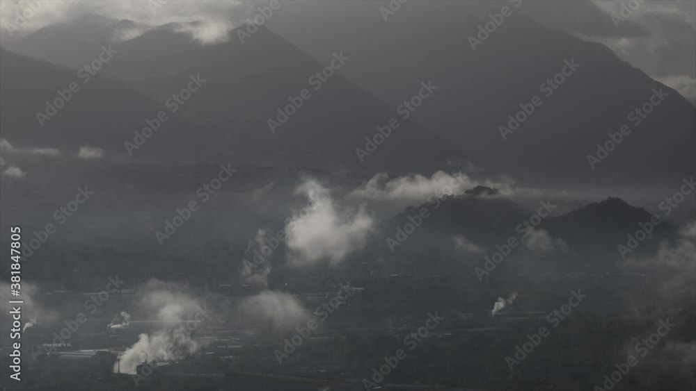 Time lapse of mist lying in the folds of hills.Condensation and ...