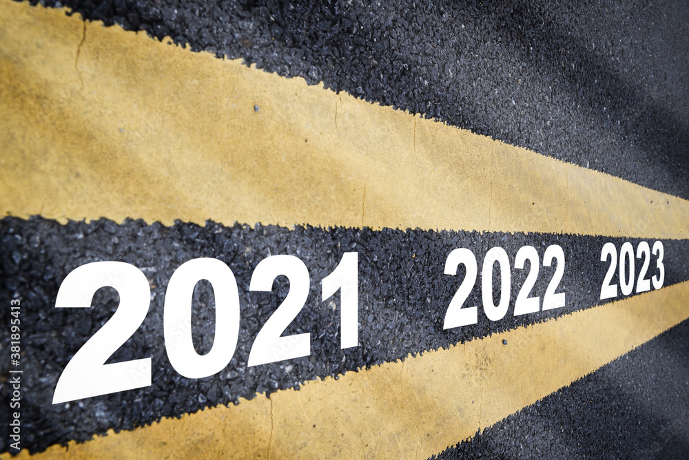Year 2021 to 2023 on asphalt road with marking lines for giving ...