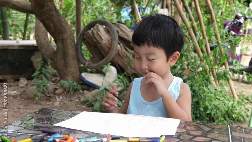 Vidéo Stock 4K Asian child boy writing English alphabet with pencil ...