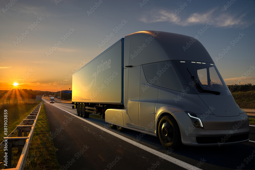 Tesla's new electric semi truck with a trailer bearing the Amazon Prime ...