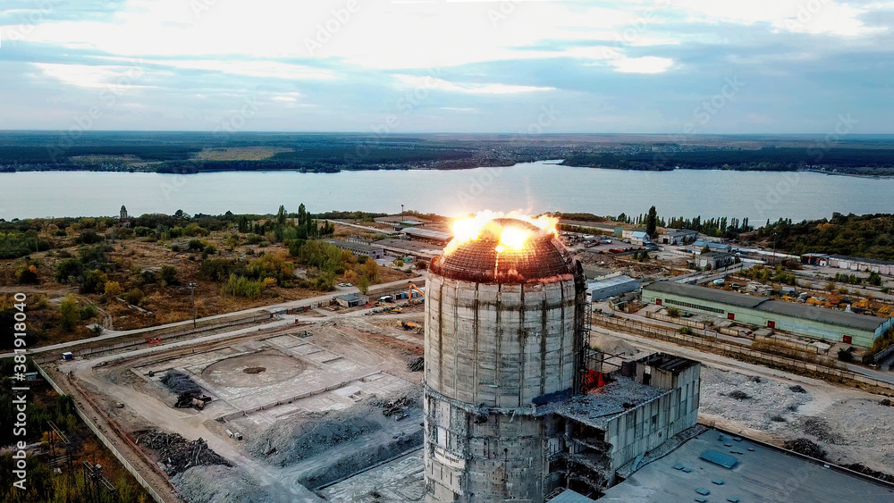 Demolition of old industrial building by exploding dynamite, aerial ...
