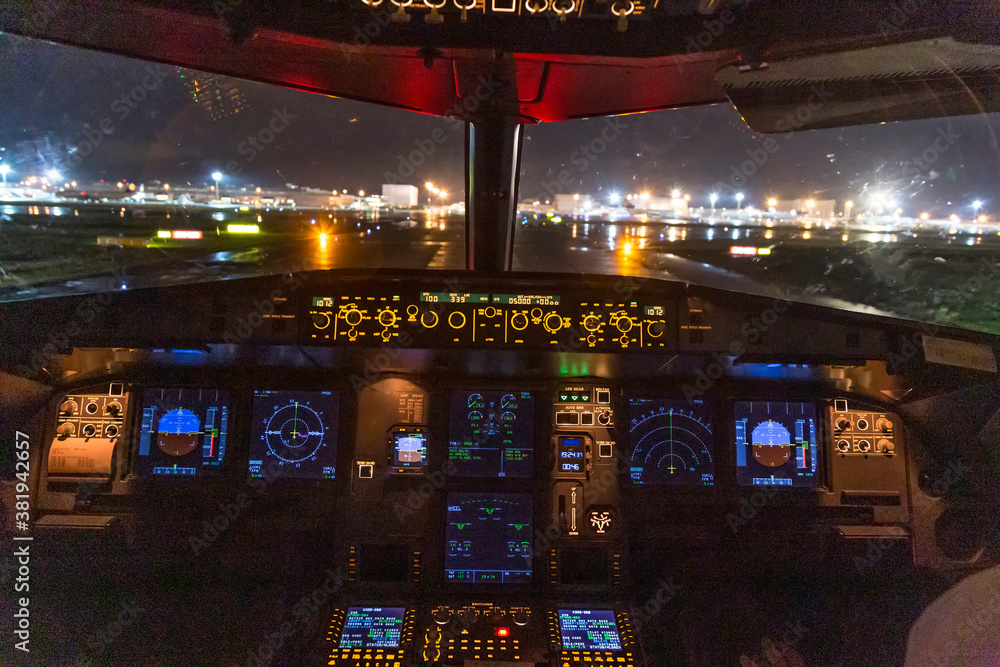 Cockpit view of a commercial jet aircraft landing at the airport Stock ...