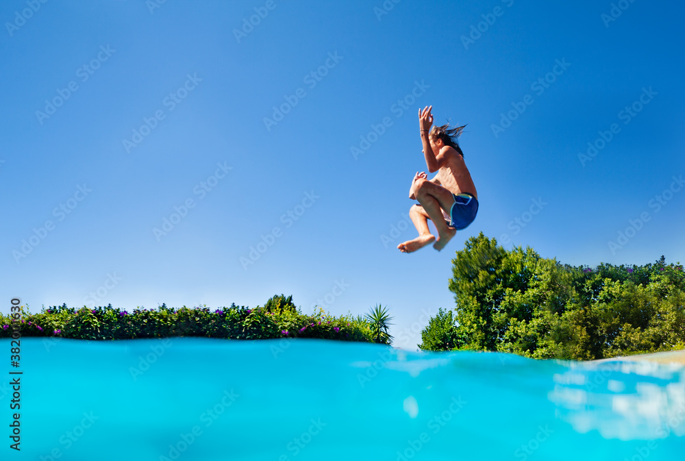 Profile photo of the boy jump high in action happy pose with lifted ...