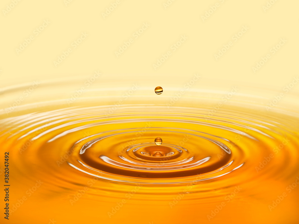 golden oil drop with ripples vegetable, organic, olive, sunflower oil ...