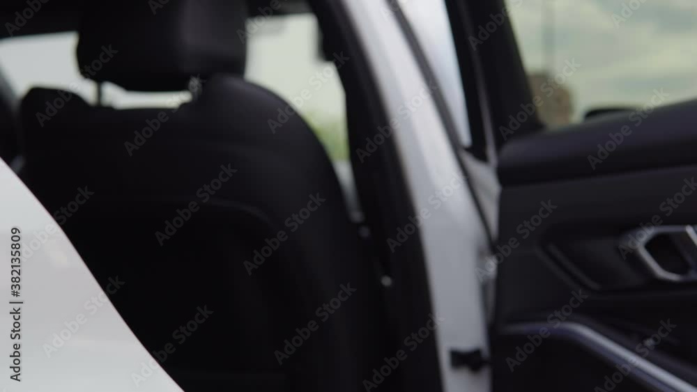 A back door of a modern car gets open and closed - closeup Stock ビデオ ...