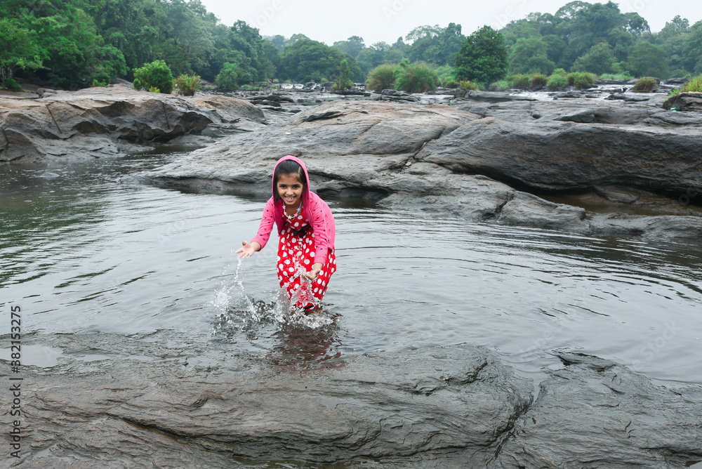 Indian girl child lone happy little kid relaxing enjoying freedom ...
