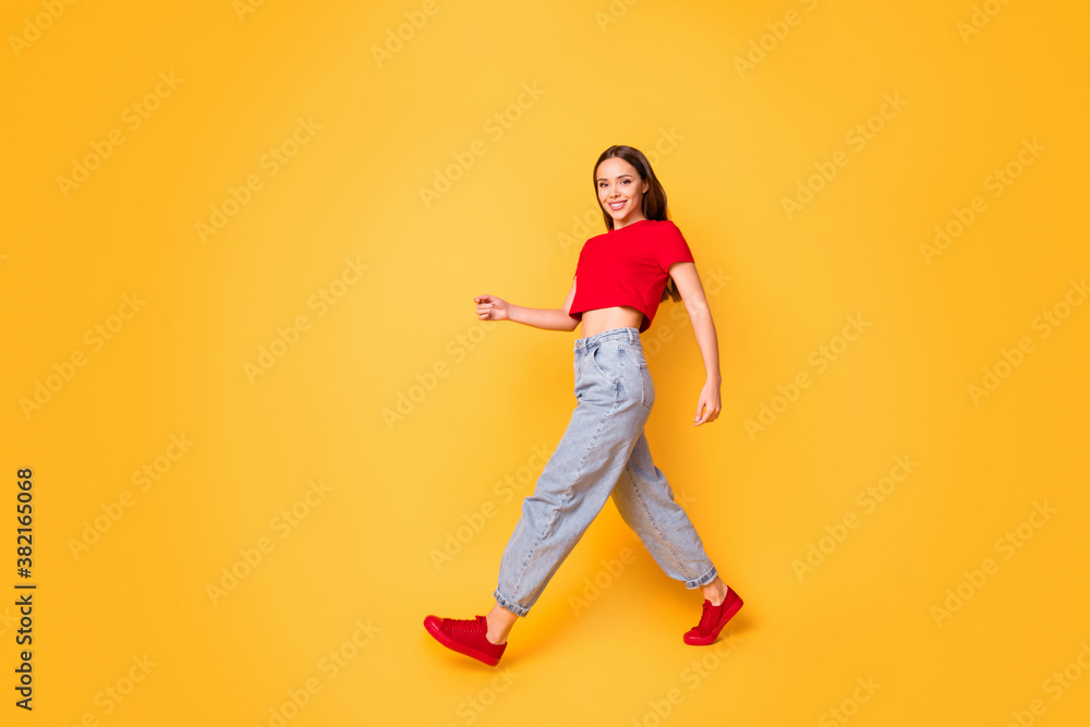 Full length photo of lady making step walking down street wear red crop ...