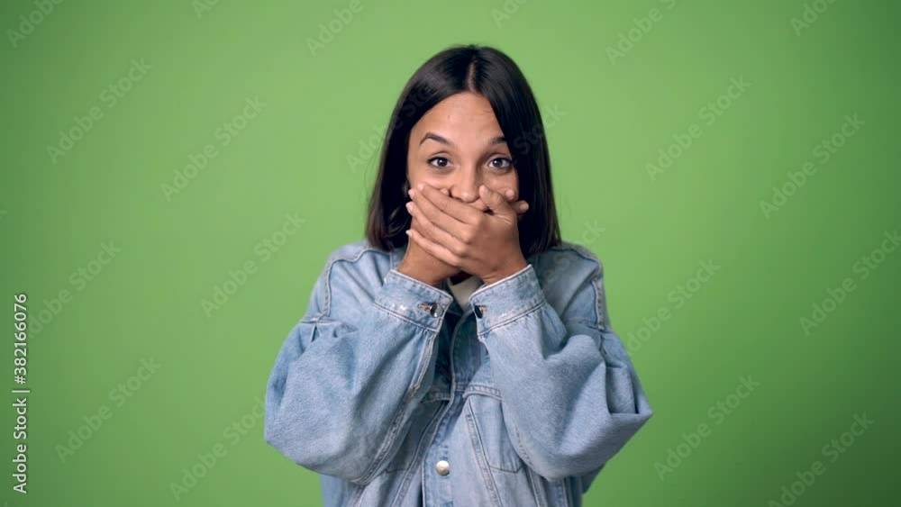 woman with surprise and shocked facial expression on green screen ...